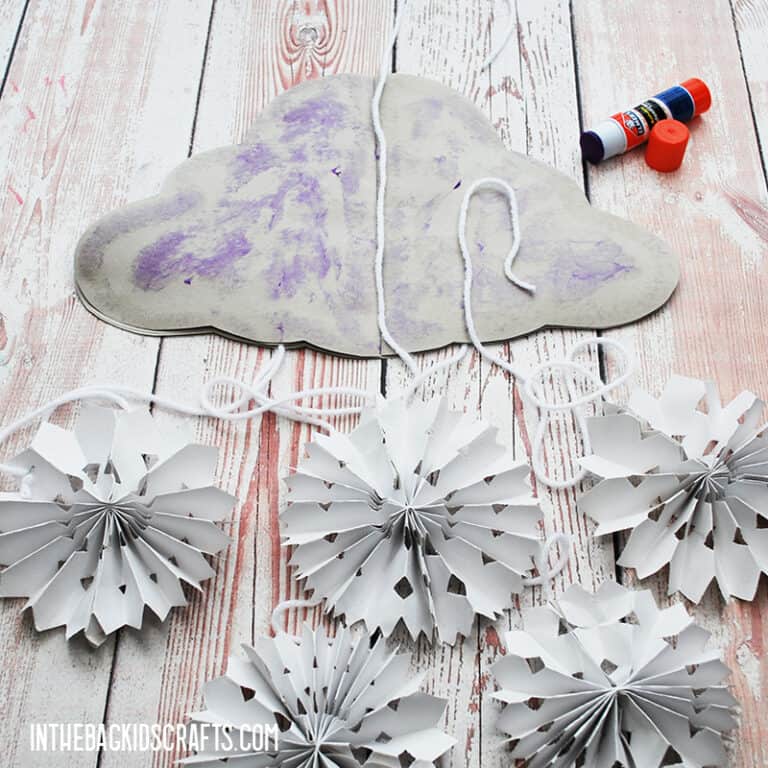 Winter Paper Craft Snowflake Mobile • In the Bag Kids' Crafts